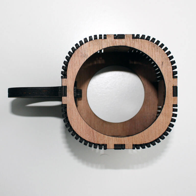 Laser cutting of cup holders in plywood - MetaQuip BV